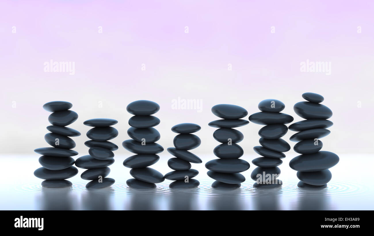 Harmony and balance. Group of Pebble stacks on the water over blue sky ...