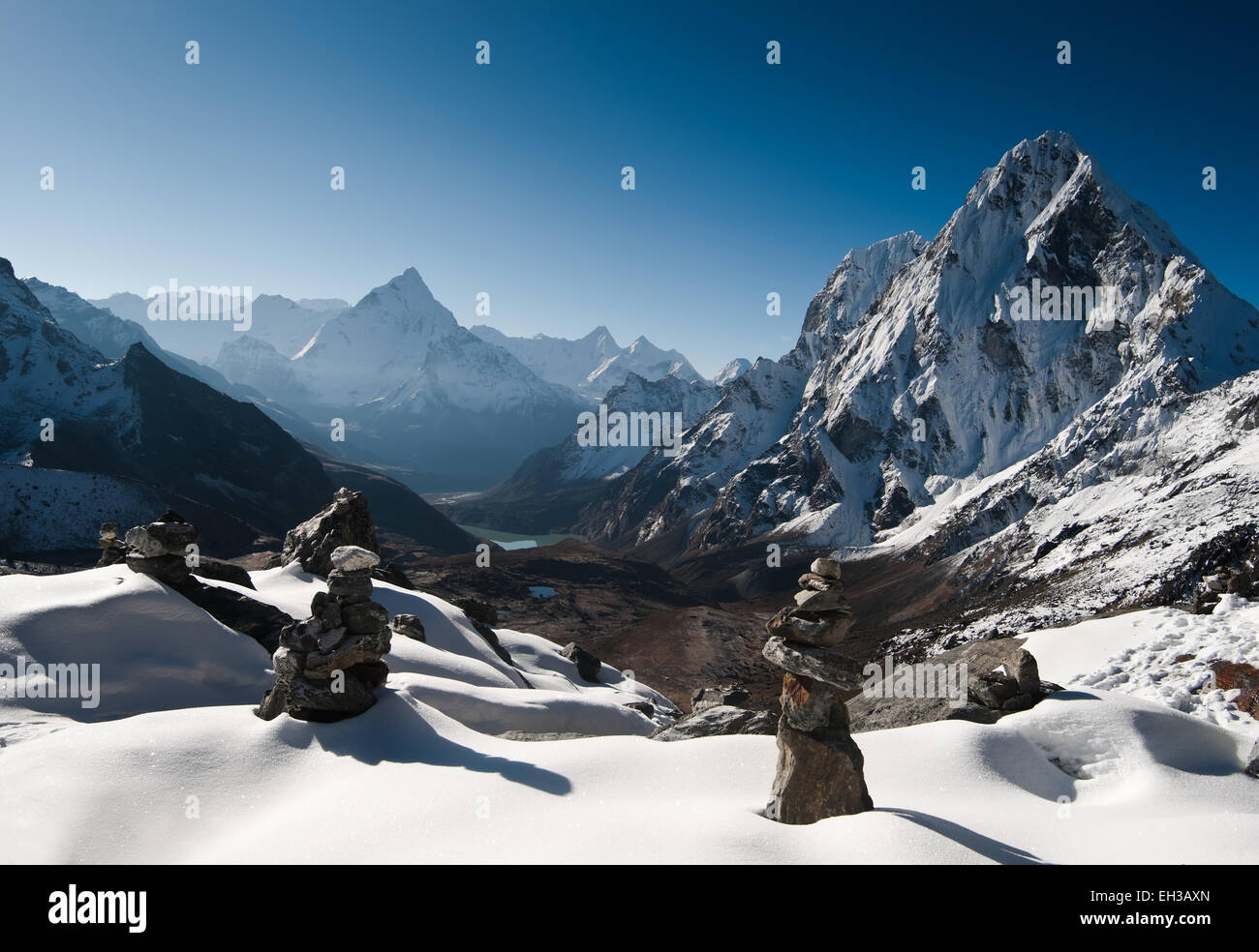 Cho La pass and stone stacks at daybreak in Himalayas. Hiking in Nepal ...
