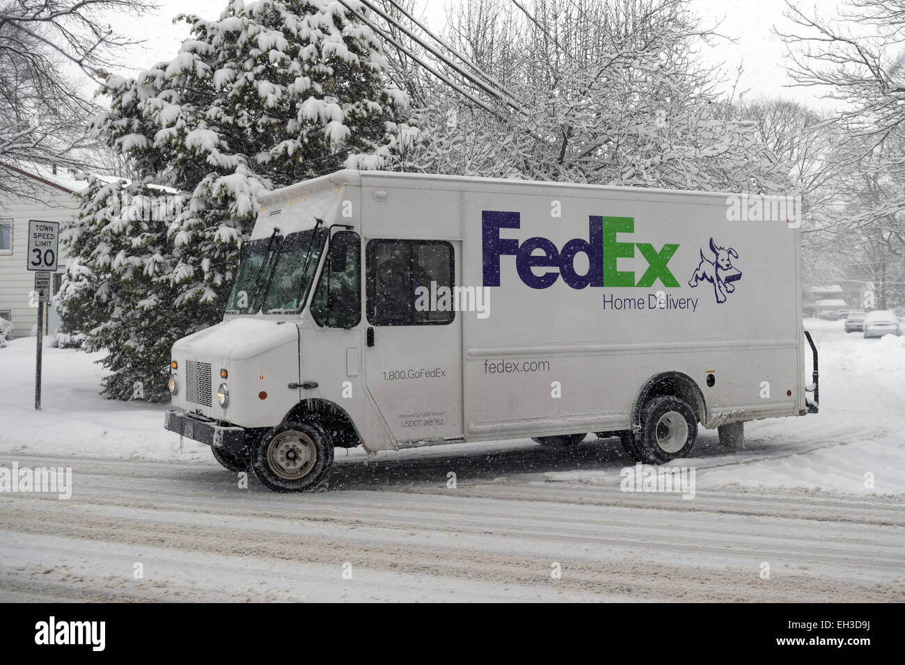 Merrick, New York, USA. 5th Mar, 2015. A FedEx truck is making ...