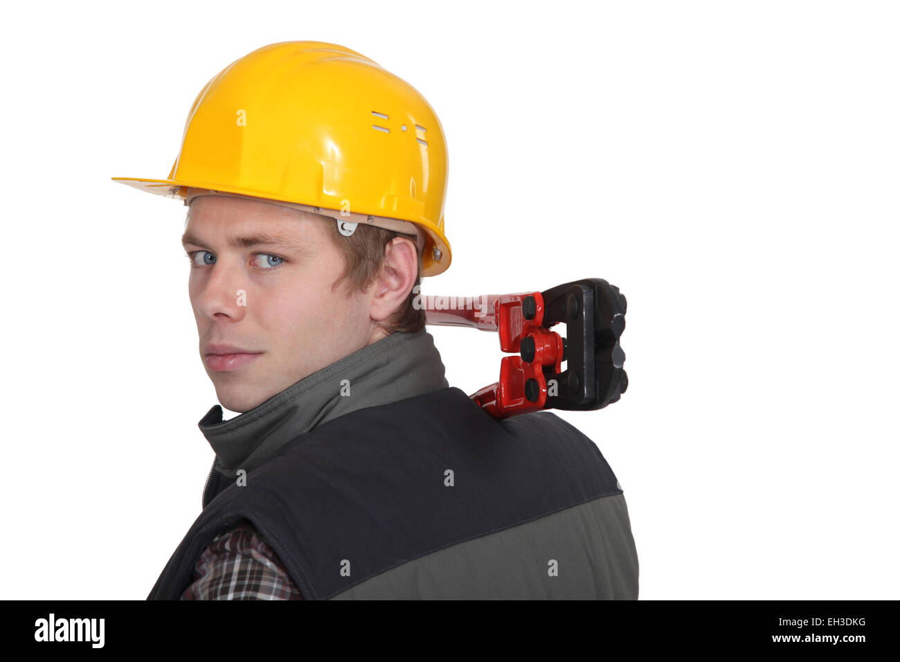 Man holding bolt cutter over shoulder Stock Photo - Alamy