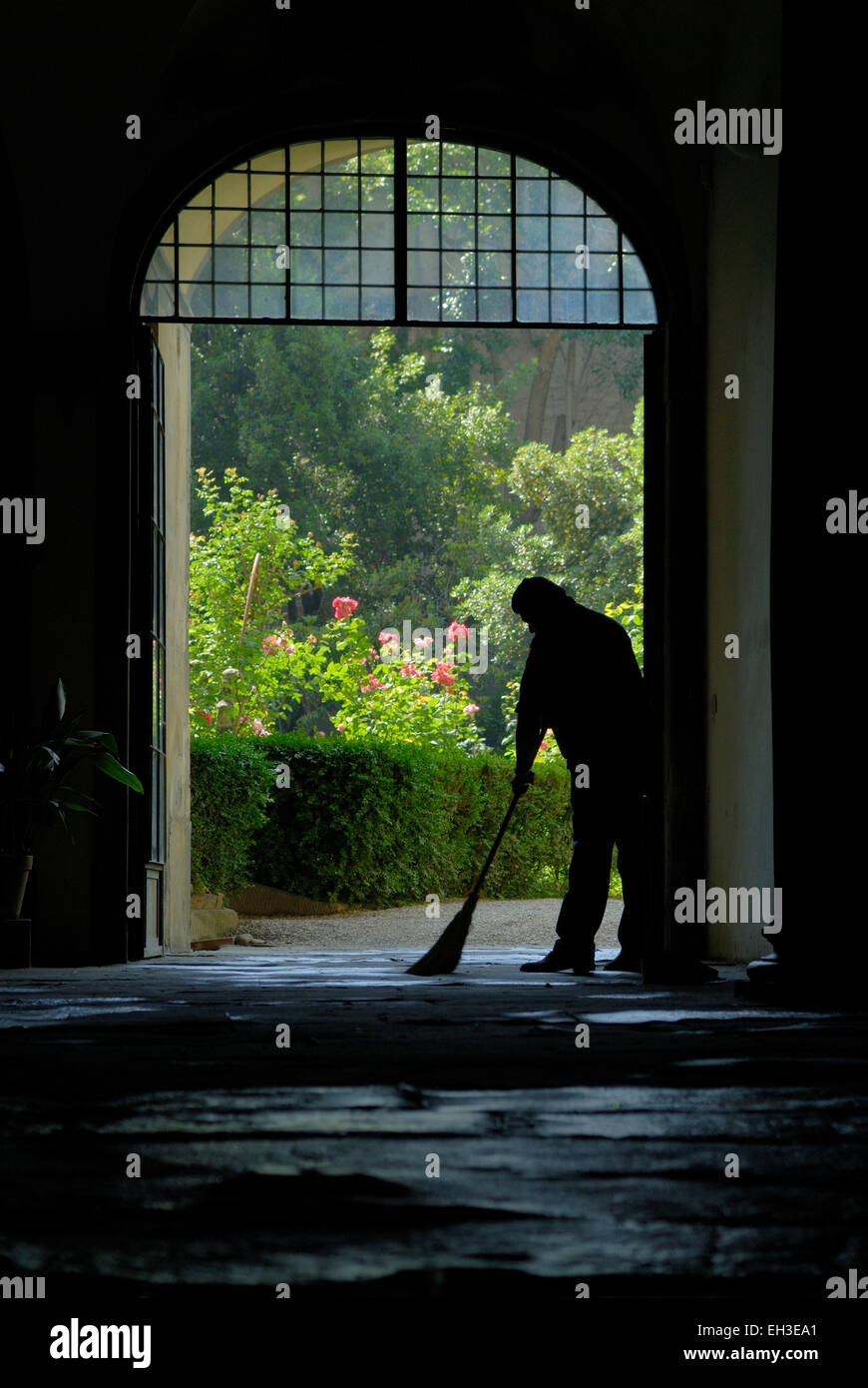 Working with broom when sweeping hi-res stock photography and images ...