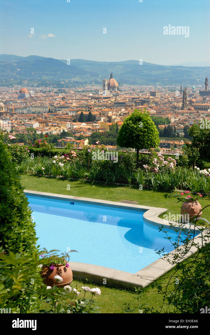 Swimmingpool in a garden with magnificent view over city of Florence ...