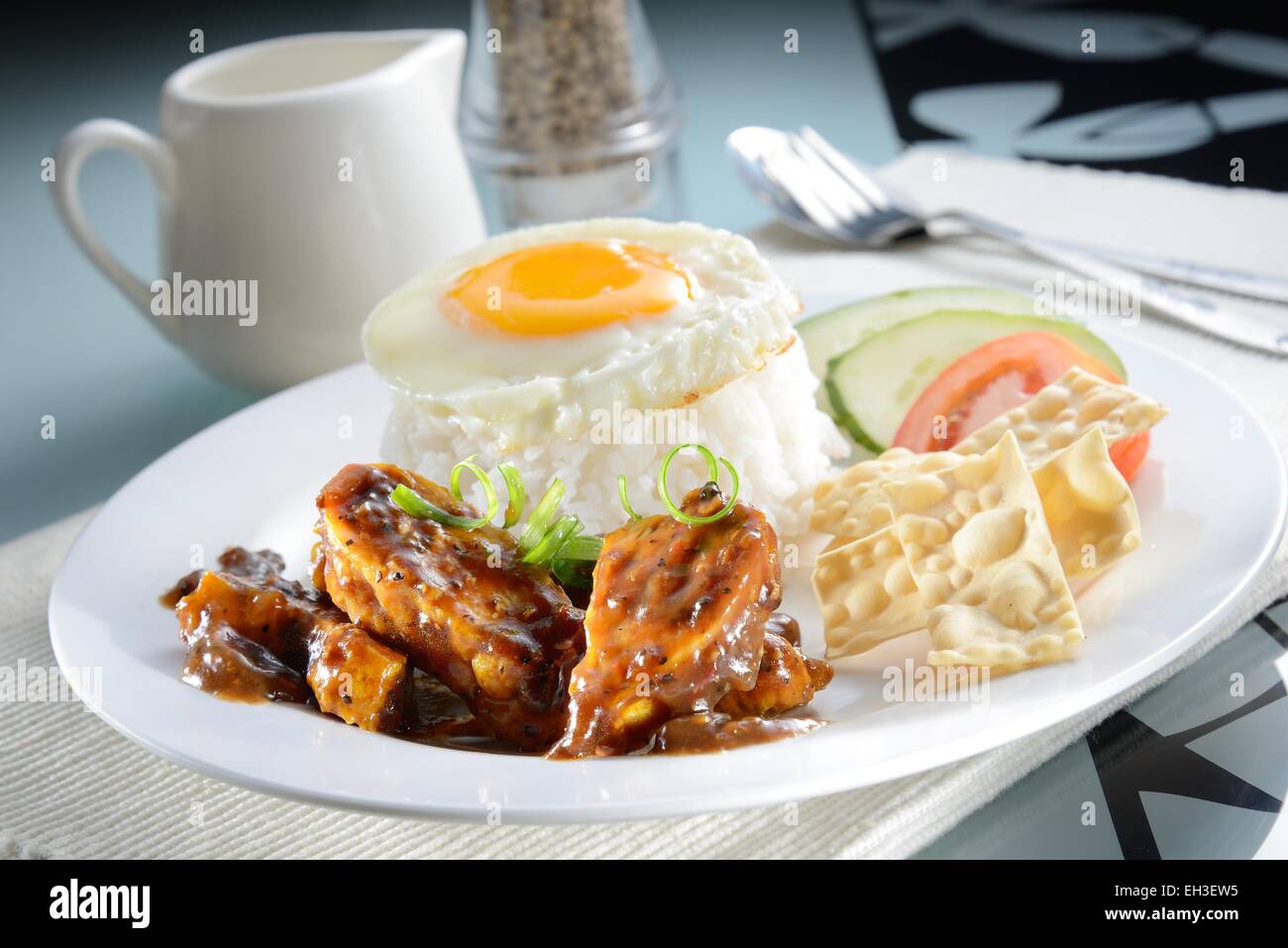 Black Pepper Chicken Rice with nice table setting Stock Photo - Alamy