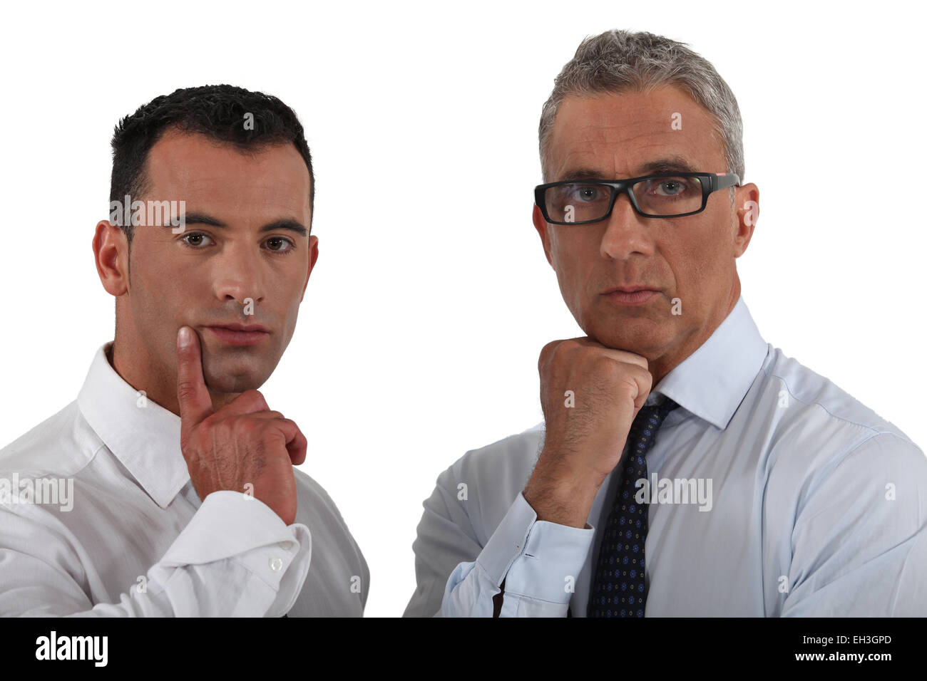 two men in deep reflection Stock Photo - Alamy