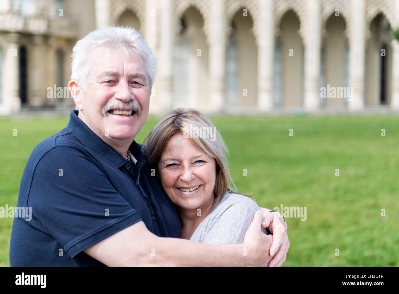 Elderly couple cuddle embrace showing hi-res stock photography and ...