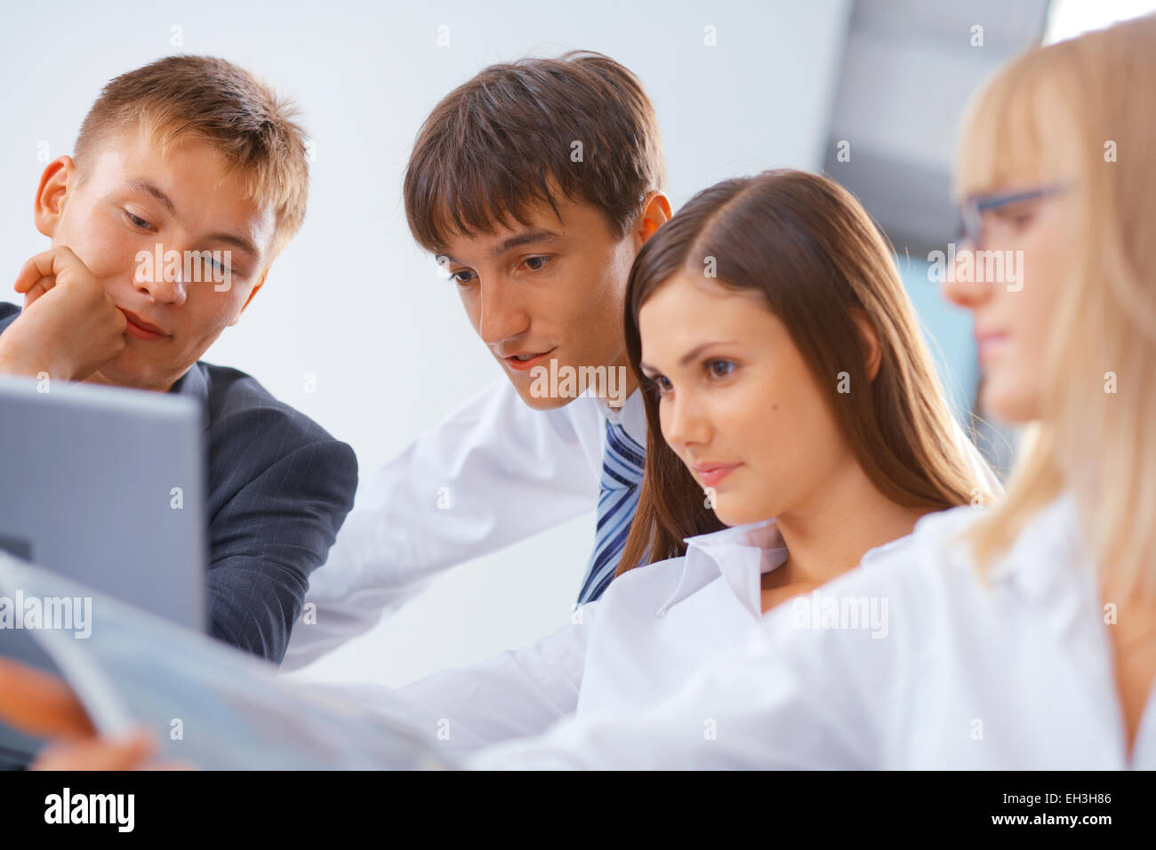 Group of young people working together Stock Photo - Alamy