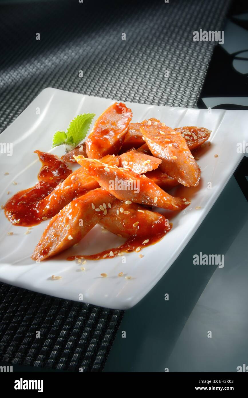 Sausage with sauces and nice table setting Stock Photo - Alamy