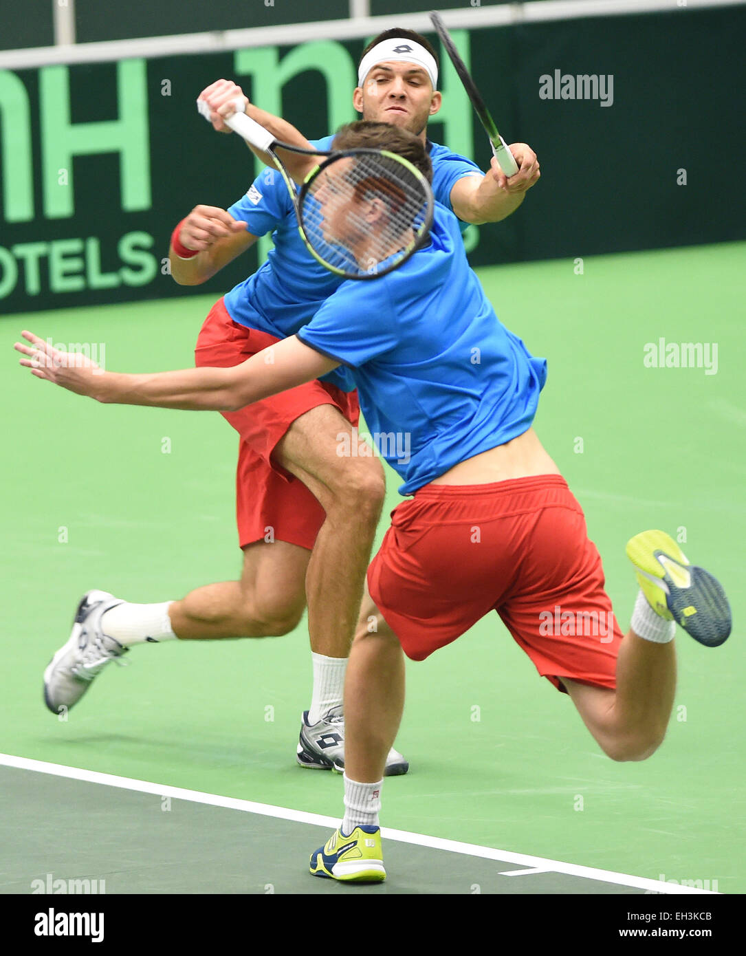 Adam Pavlasek, front, returns as his partner Jiri Vesely, rear, tries ...