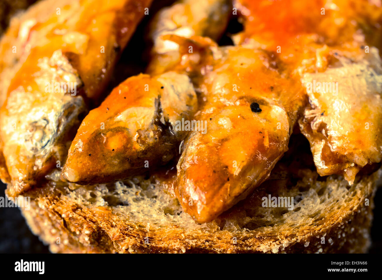 Tapas with canned fish in tomato sauce Stock Photo - Alamy