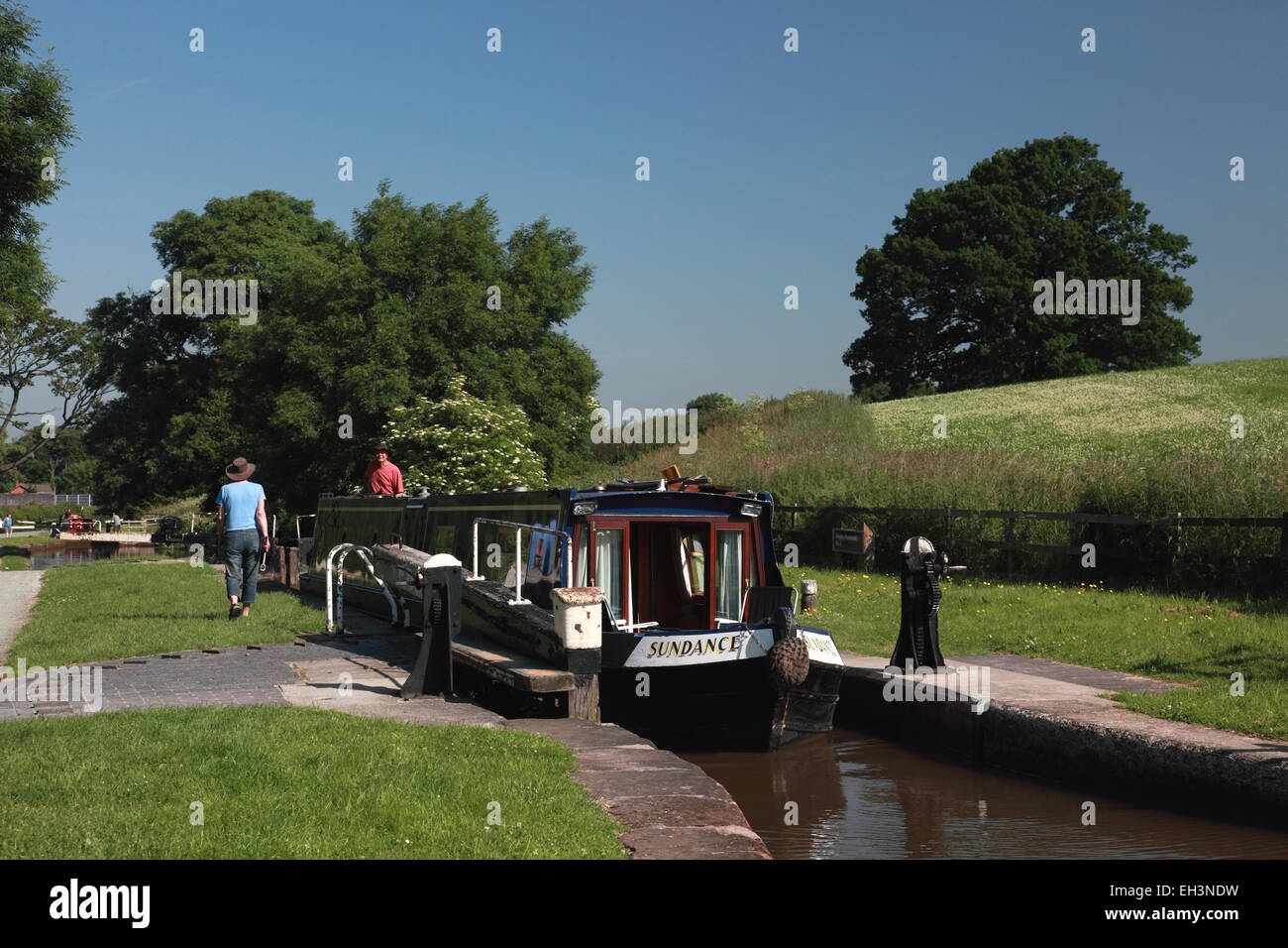 A narrowboat leaving lock 4 of the Grindley Brook flight of locks on ...