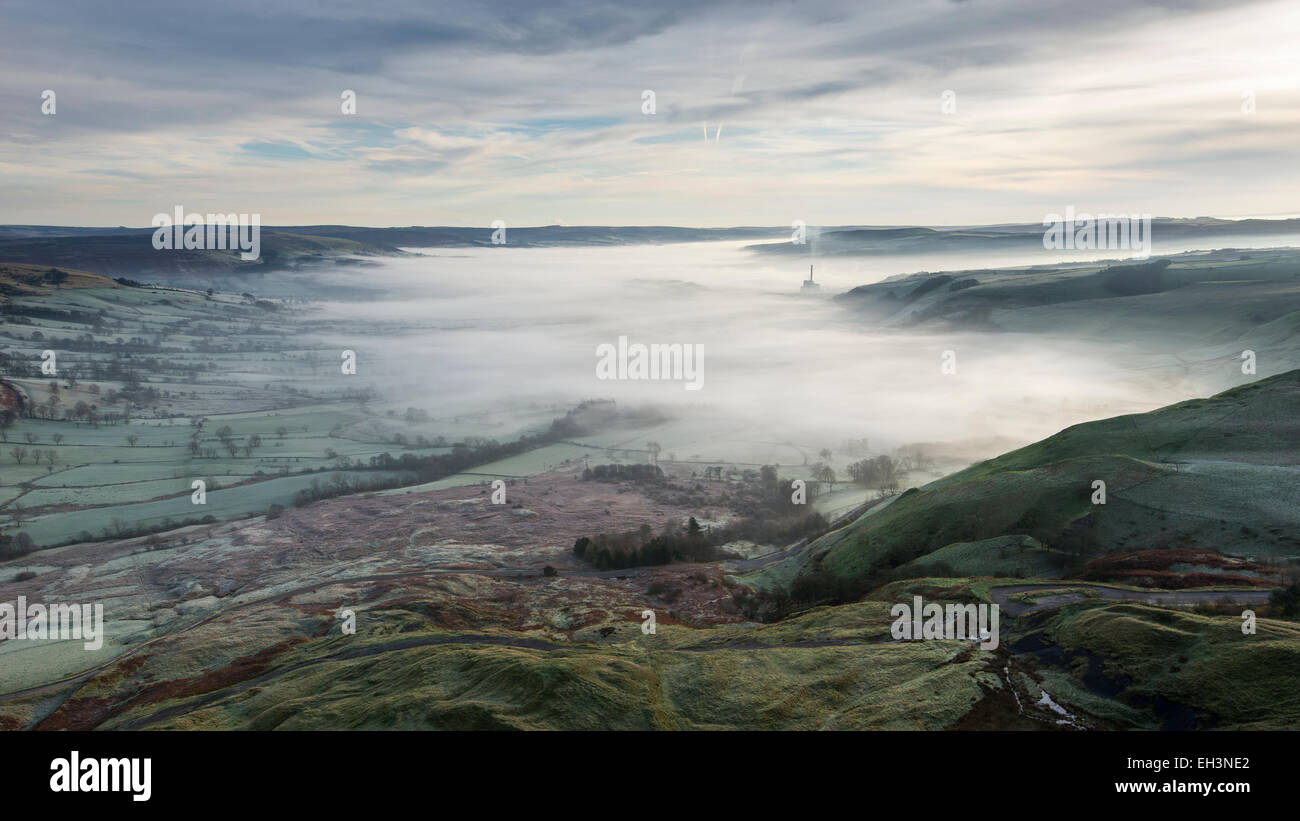 Mist over Castleton in the Peak District on an early winter morning ...