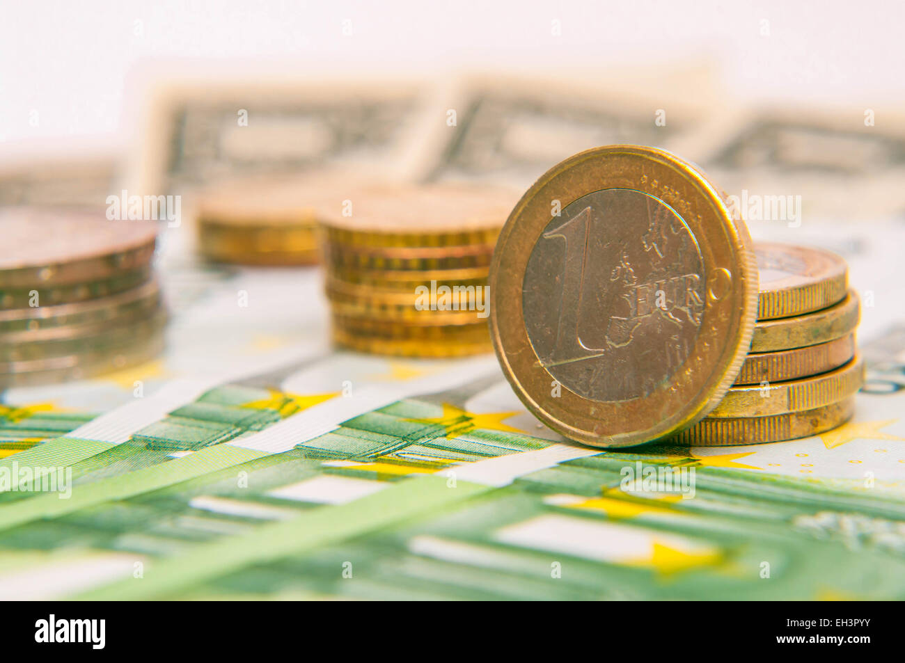 a tower of Euro coins, banknote, European currency Stock Photo - Alamy