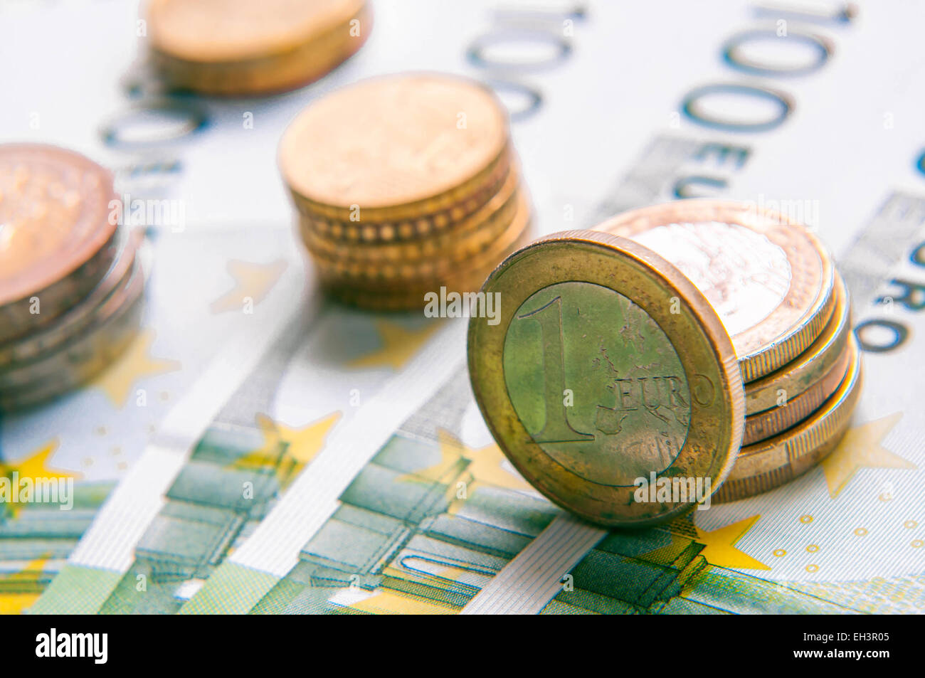 a tower of Euro coins, banknote, European currency Stock Photo - Alamy