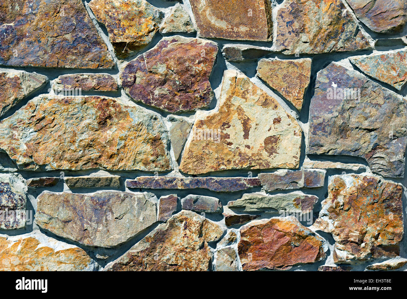 wall of rough stones in the background Stock Photo - Alamy