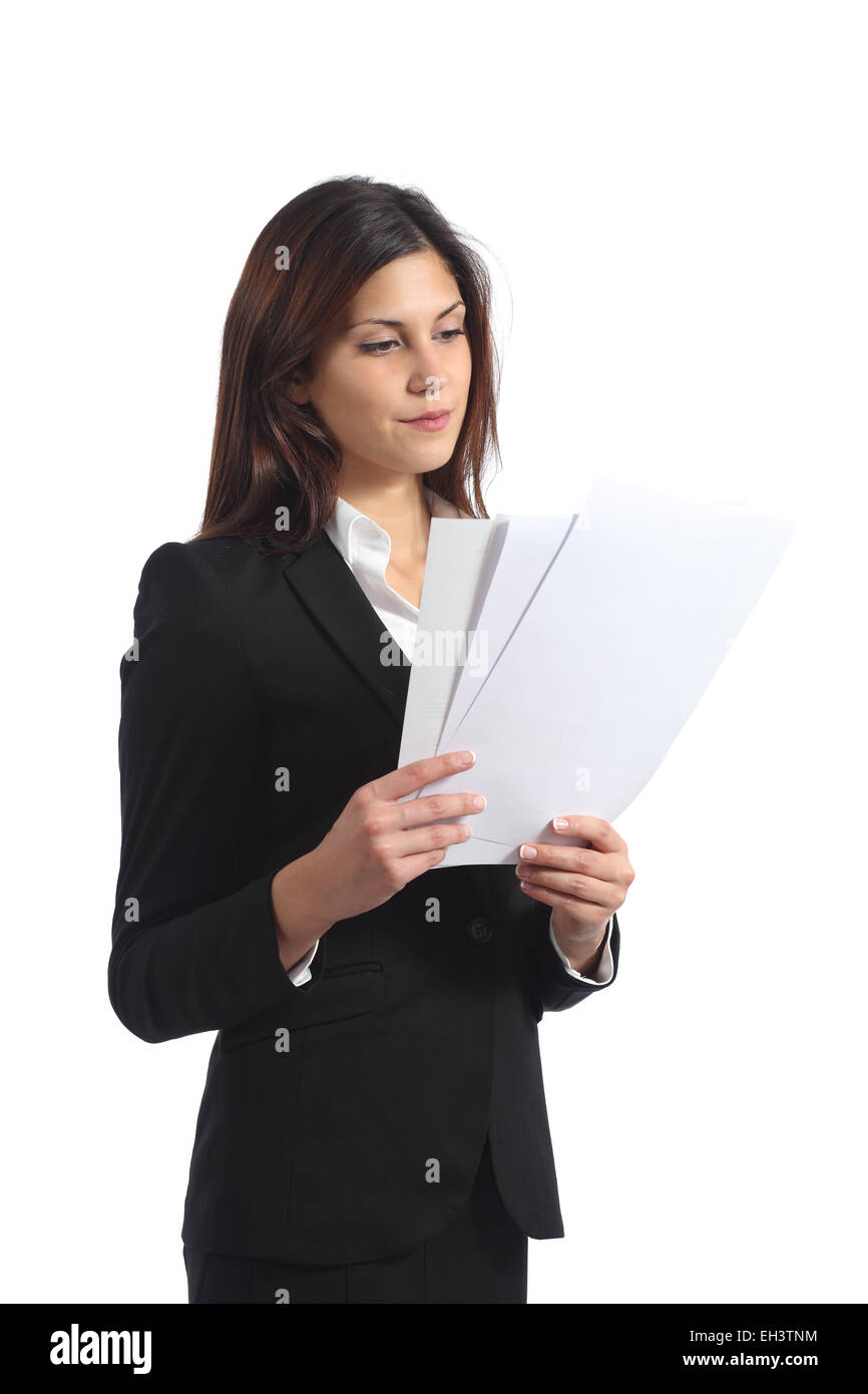 Serious business woman reading a report isolated on a white background ...