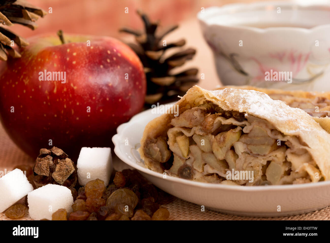 Apple strudel pie dessert with tea closeup Stock Photo - Alamy