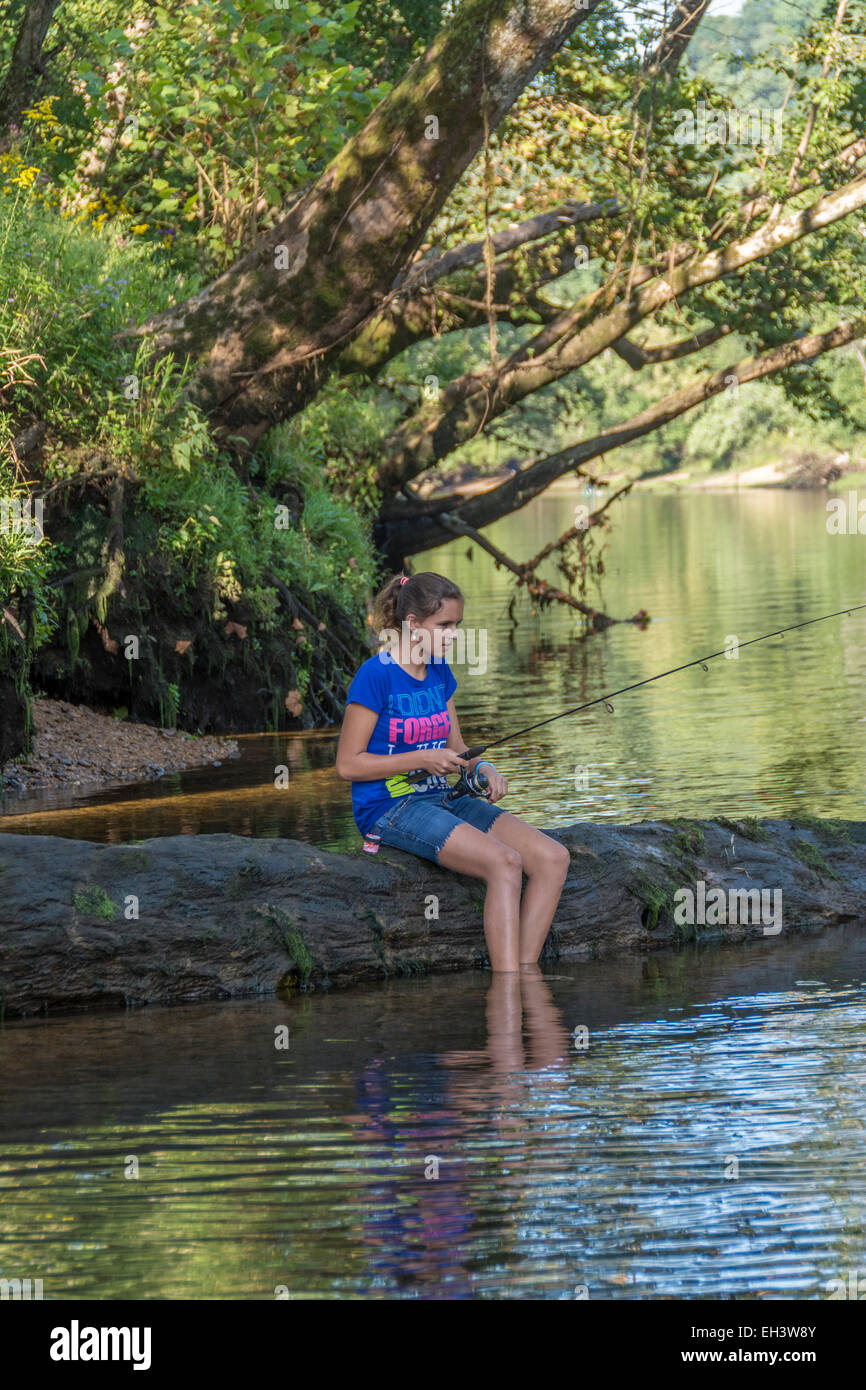 Young girl trout fishing in the Caney Fork River in central Tennessee ...