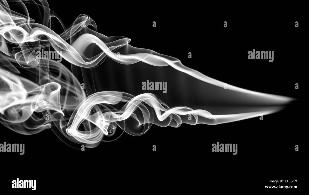 Abstract white smoke pattern and swirls on black Stock Photo - Alamy