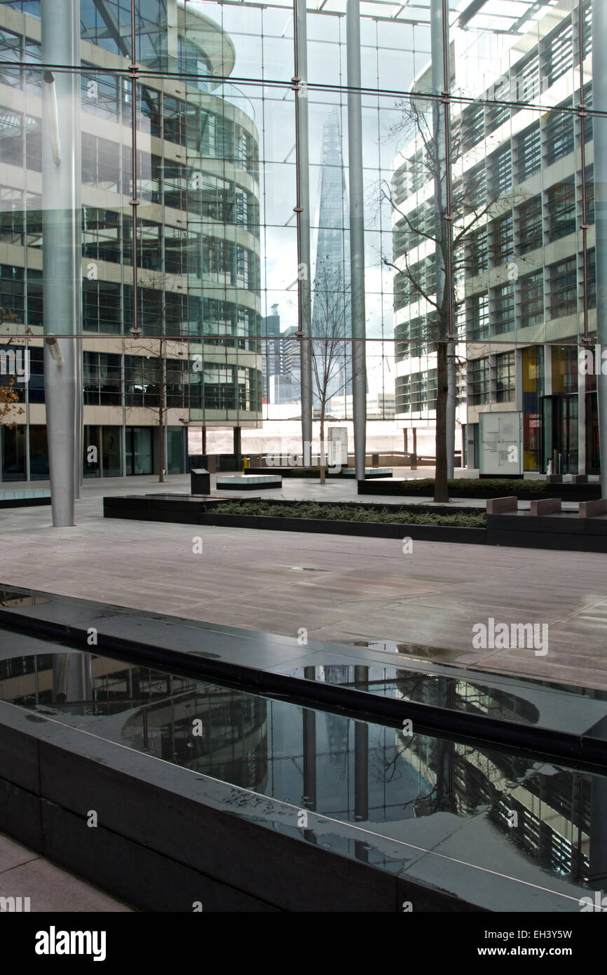 The Shard from Tower Place through glass panels of a courtyard Stock ...