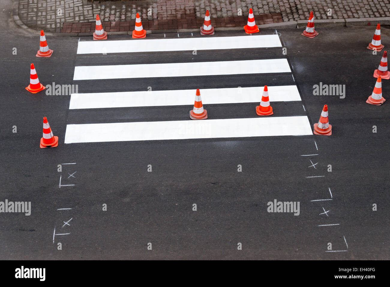 making of a new pedestrian crossing on the road Stock Photo - Alamy