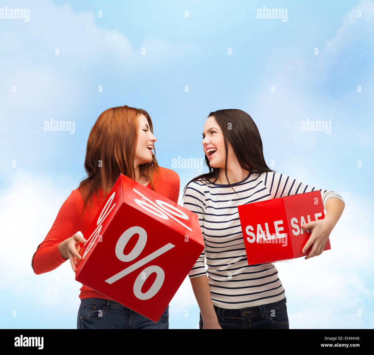 smiling teenage girl with percent and sale sign Stock Photo - Alamy
