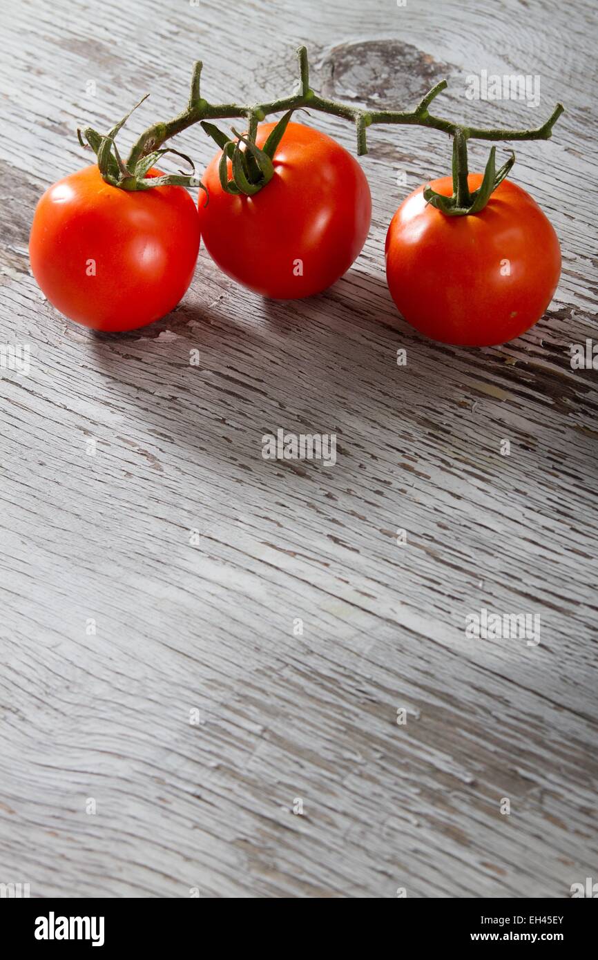 Three orange tomatoes hi-res stock photography and images - Alamy