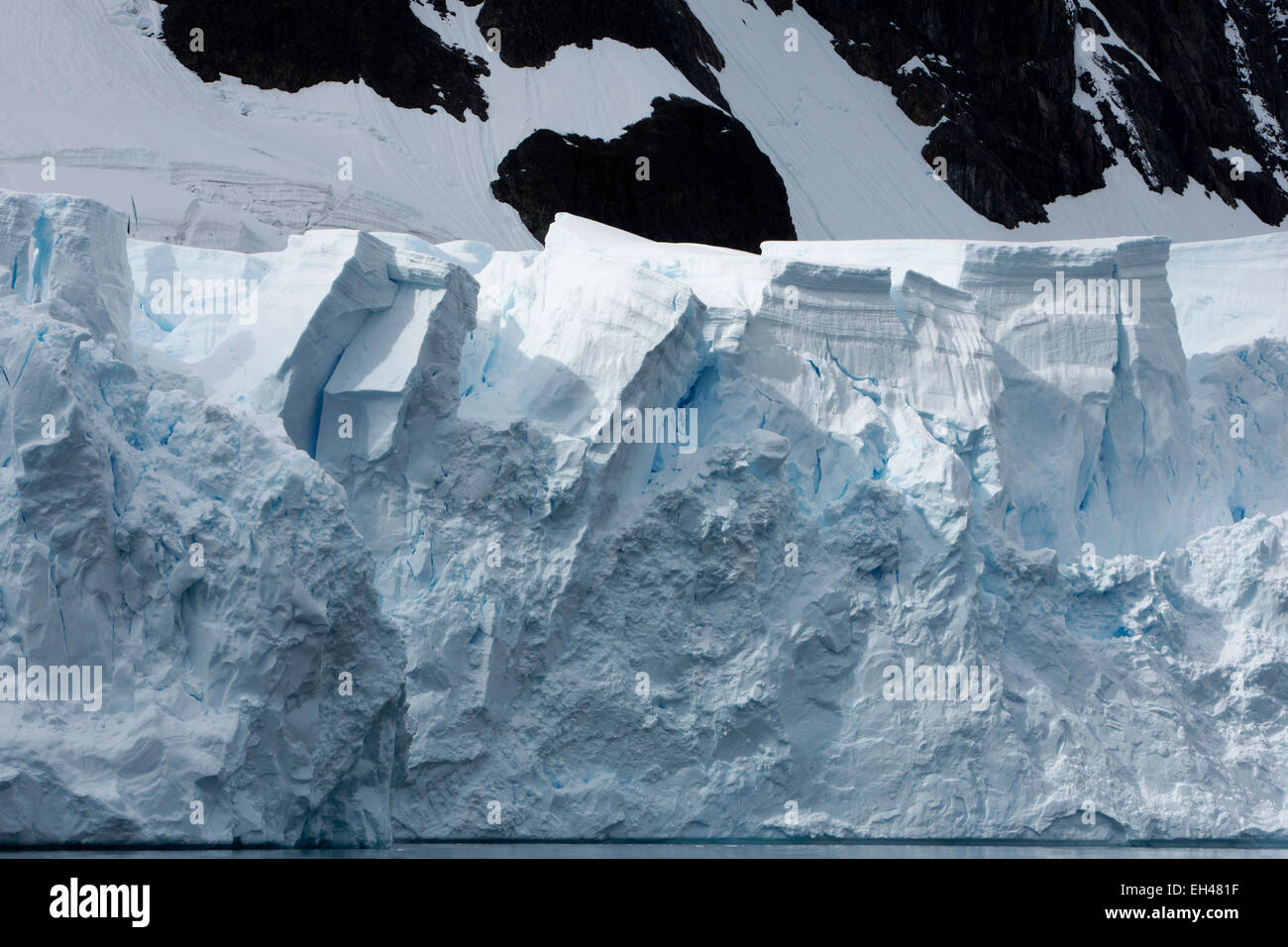 Antarctica, Paradise Bay, end of glacier breaking away into sea to form ...