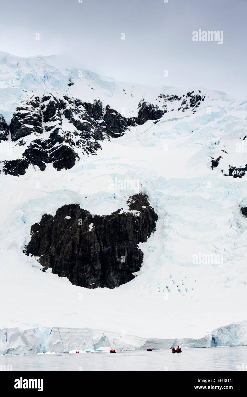 Antarctica, Paradise Bay, cruise ship passengers on zodiac cruise to ... Antarctica, Paradise Bay, cruise ship passengers on zodiac cruise to ...