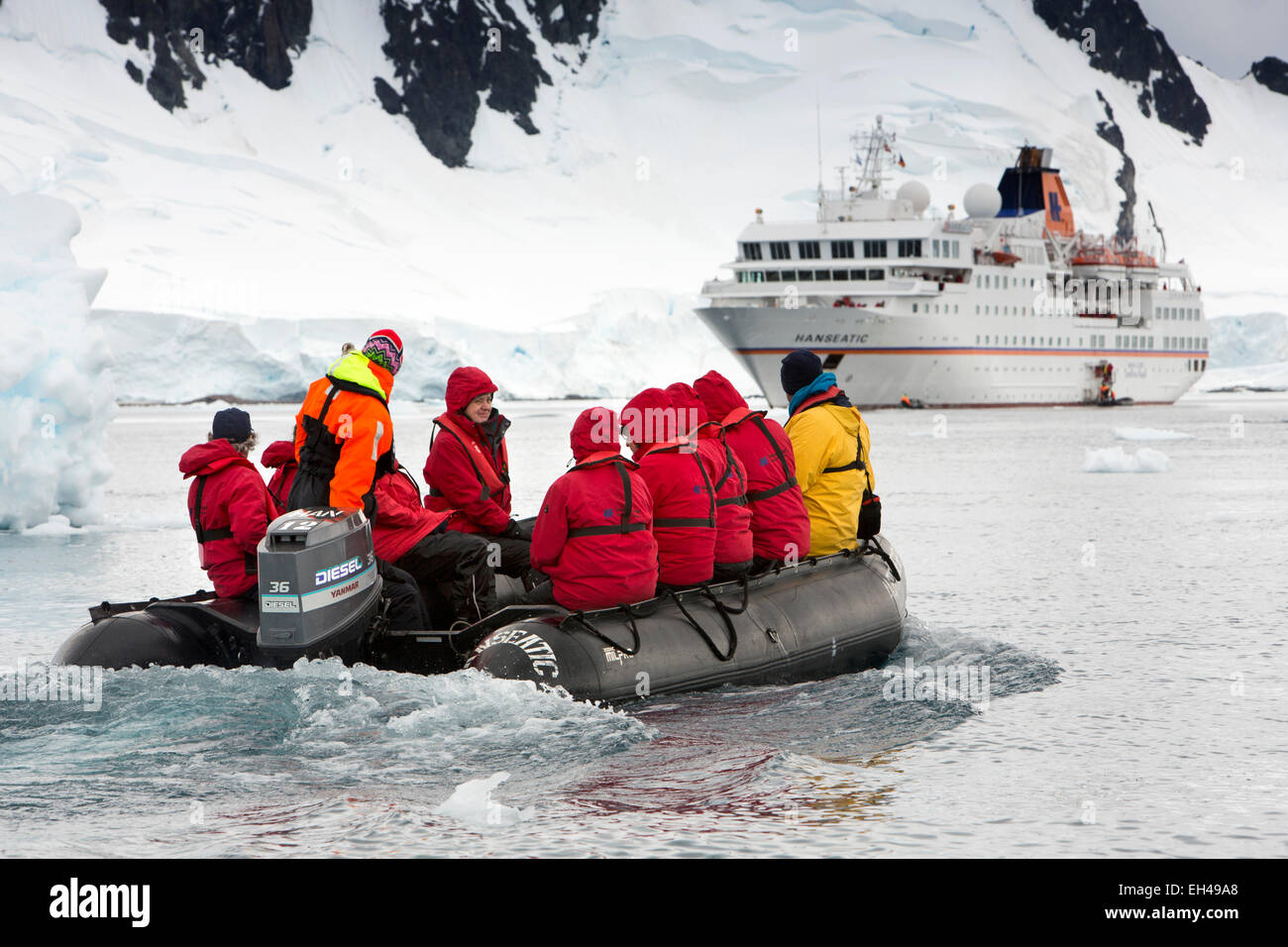 Antarctica, Paradise Bay, cruise ship passengers in zodiac aproaching ... Antarctica, Paradise Bay, cruise ship passengers in zodiac aproaching ...