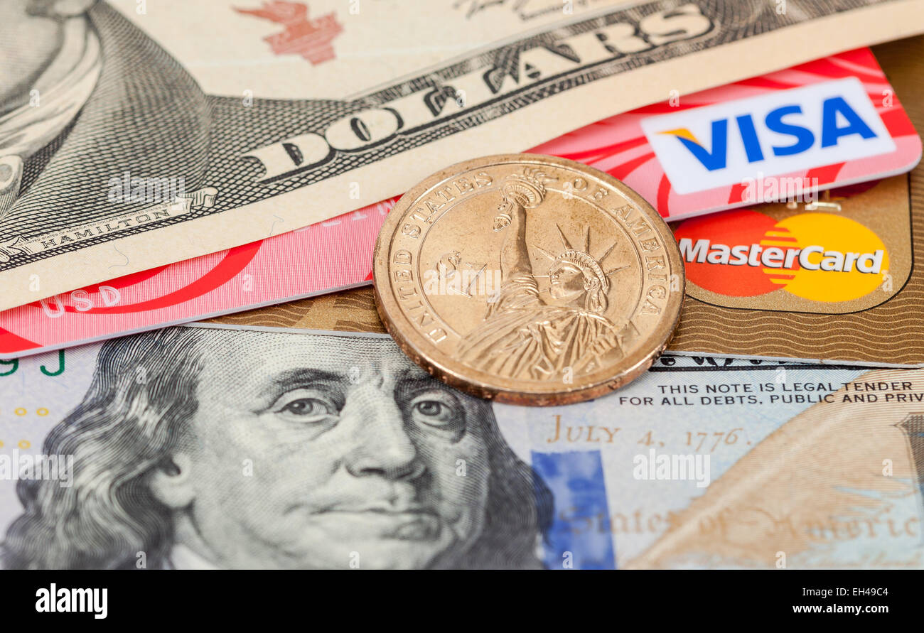 Photo of VISA and Mastercard credit card with american dollars Stock ...