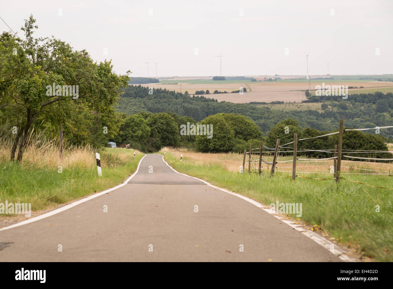 German country road with rural surroundings Stock Photo - Alamy