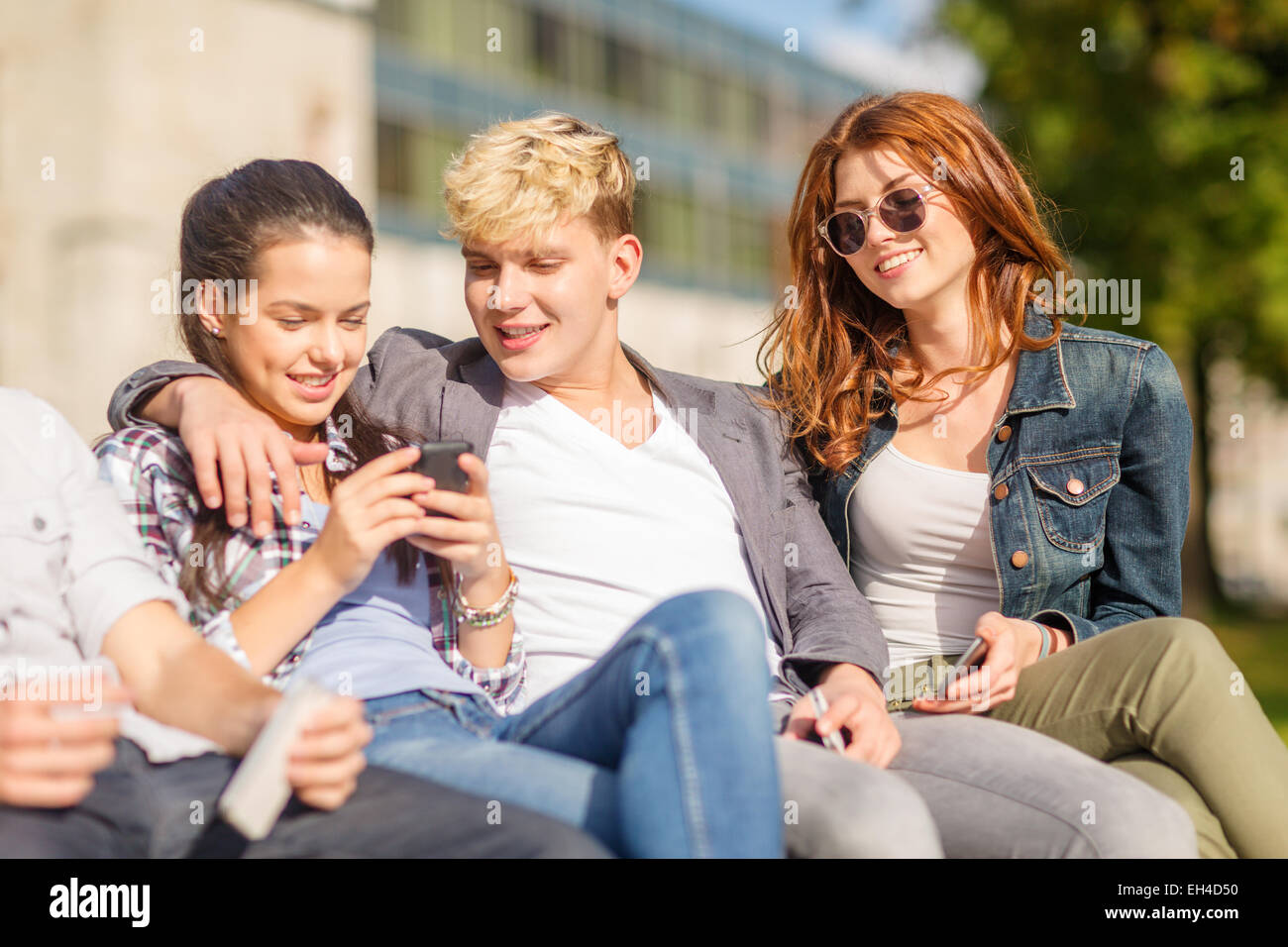 group of students or teenagers with smartphones Stock Photo - Alamy