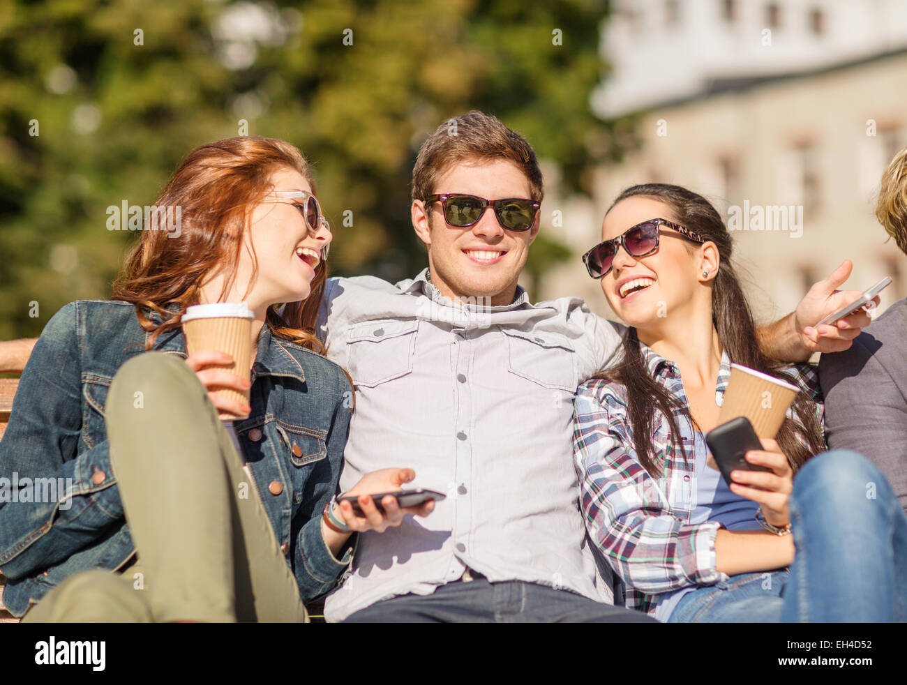 group of students or teenagers with smartphones Stock Photo - Alamy