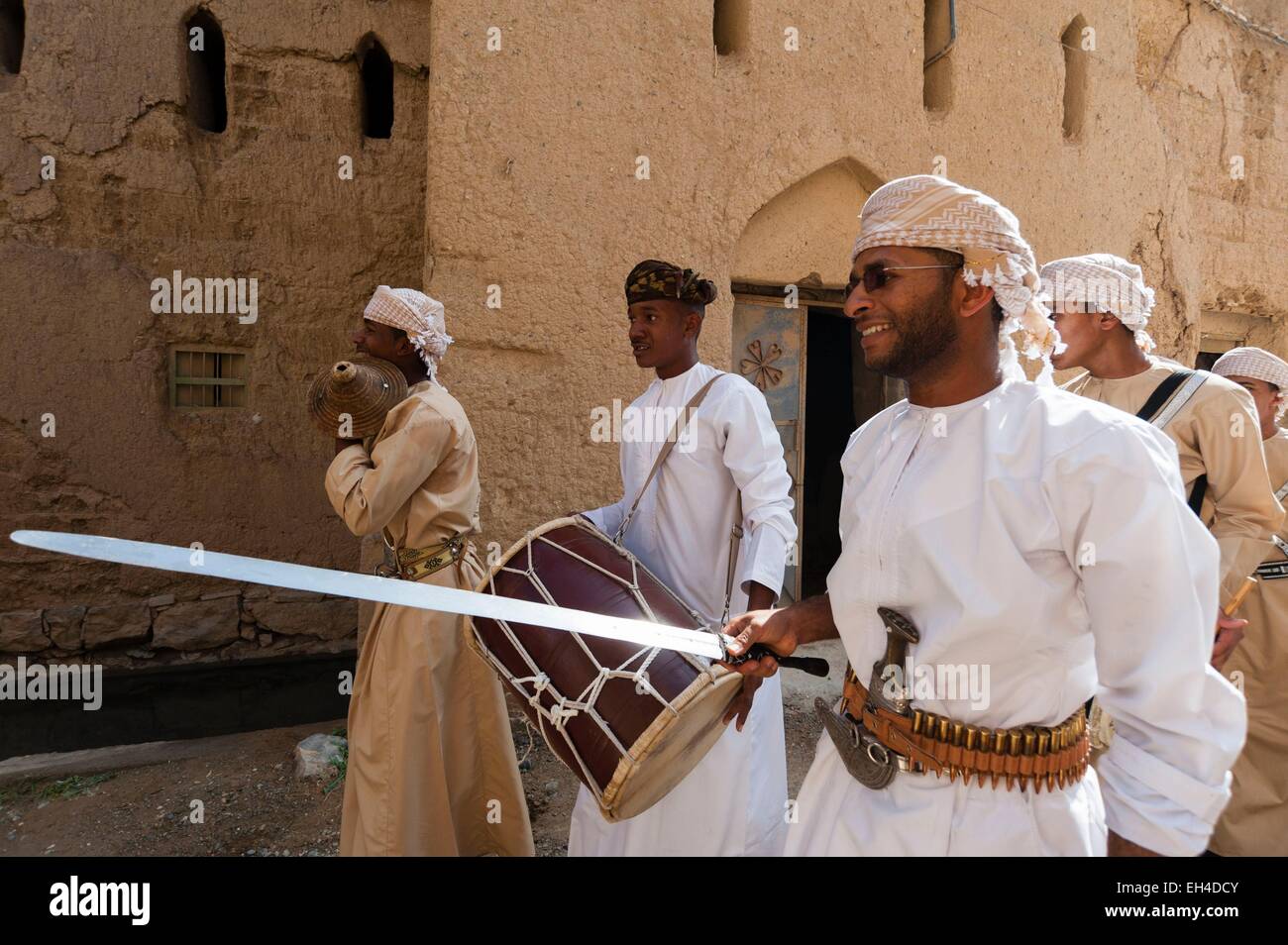 Oman, Al Hamra, Men in traditional dresses Stock Photo - Alamy