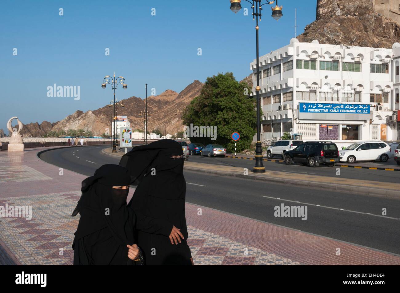 Oman, Muscat, Women walking along the Mutrah corniche Stock Photo - Alamy