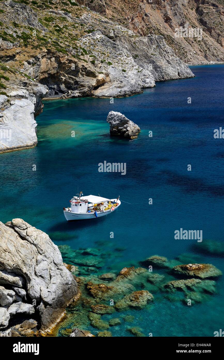 Greece, Cyclades, Amorgos island, fishing boat at Agia Anna beach Stock ...