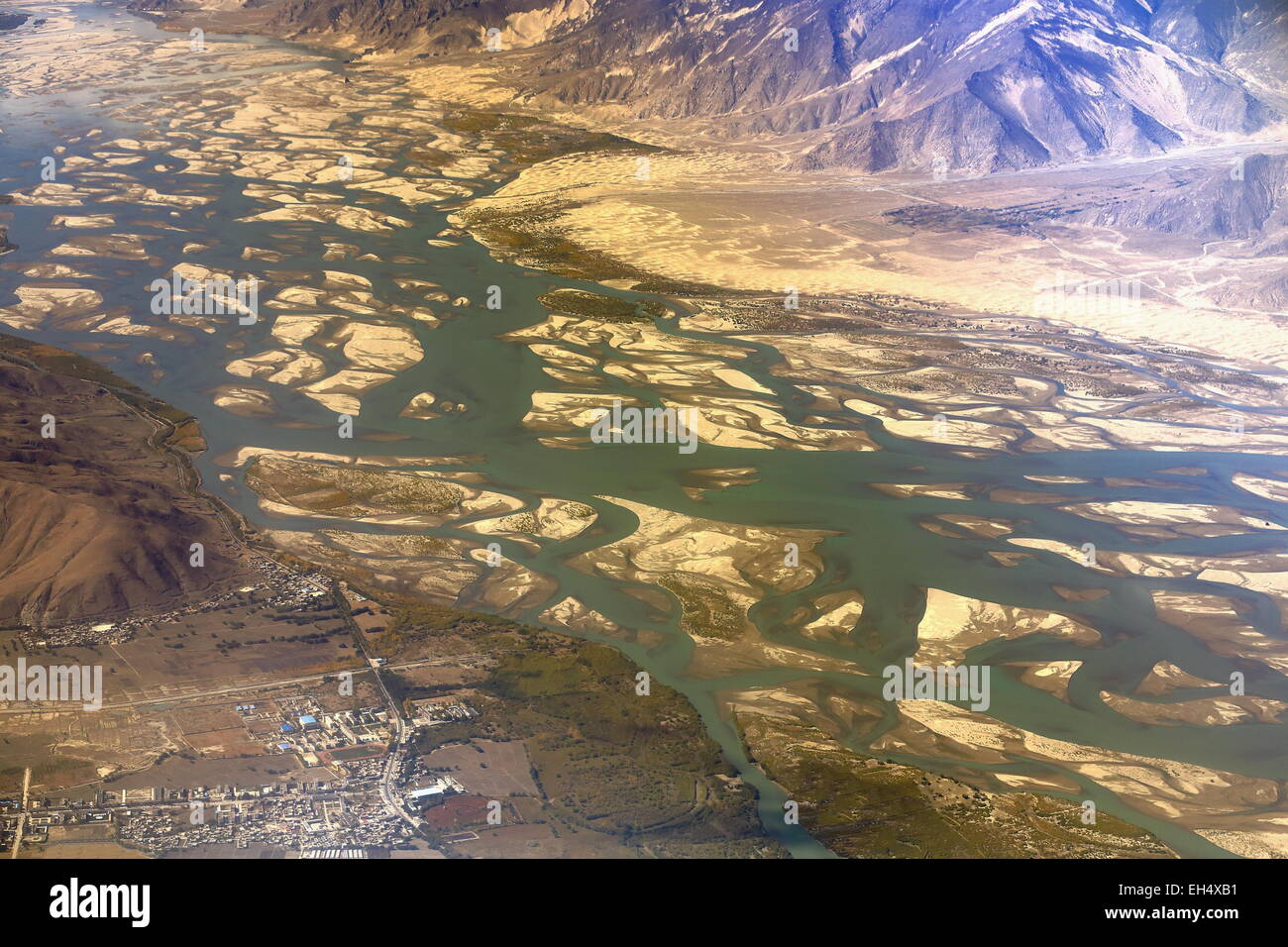 The Yarlung tsangpo-river flowing through the tibetan plateau near ...