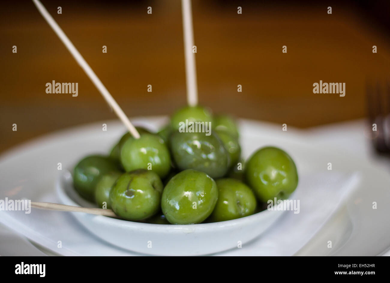 Green Olives with Toothpick Stock Photo - Alamy