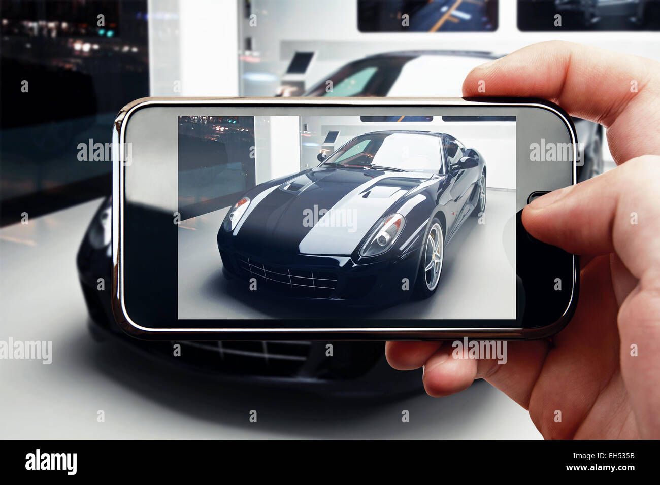 Smart phone mobile photo in car showroom Stock Photo - Alamy