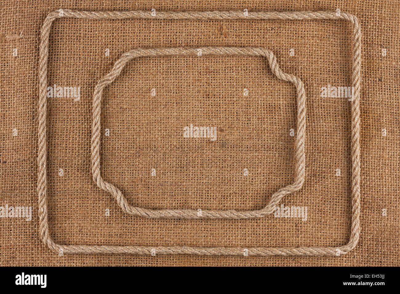 Two frame of rope, lies on a background of burlap, with place for your ...