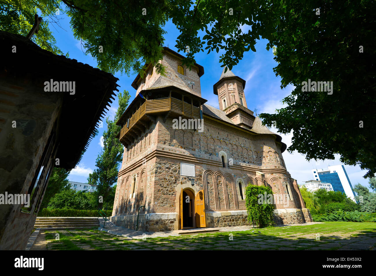 Old Church with branches of tree and blue sky Stock Photo - Alamy