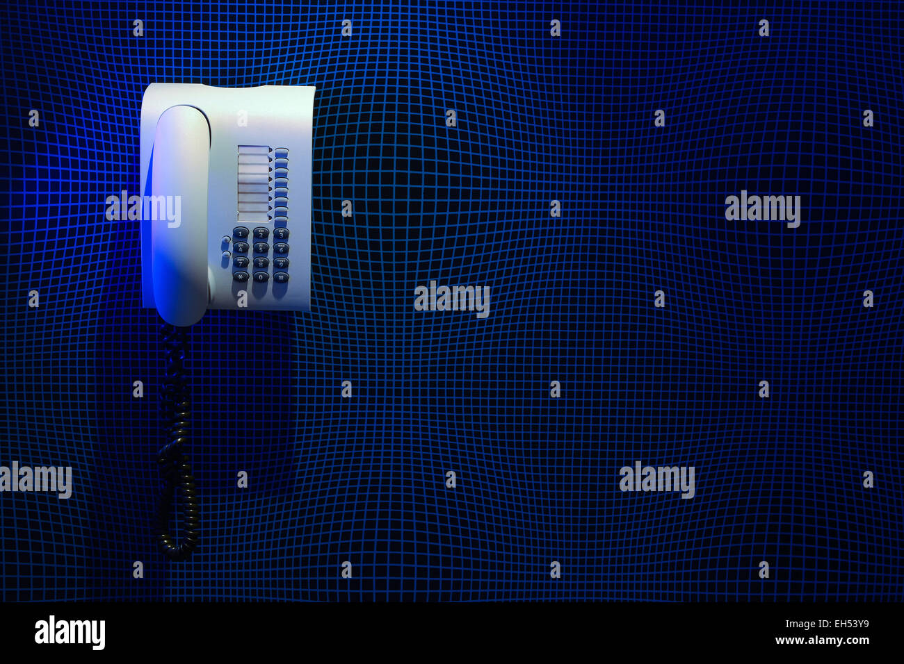 White phone on textured wall Stock Photo - Alamy