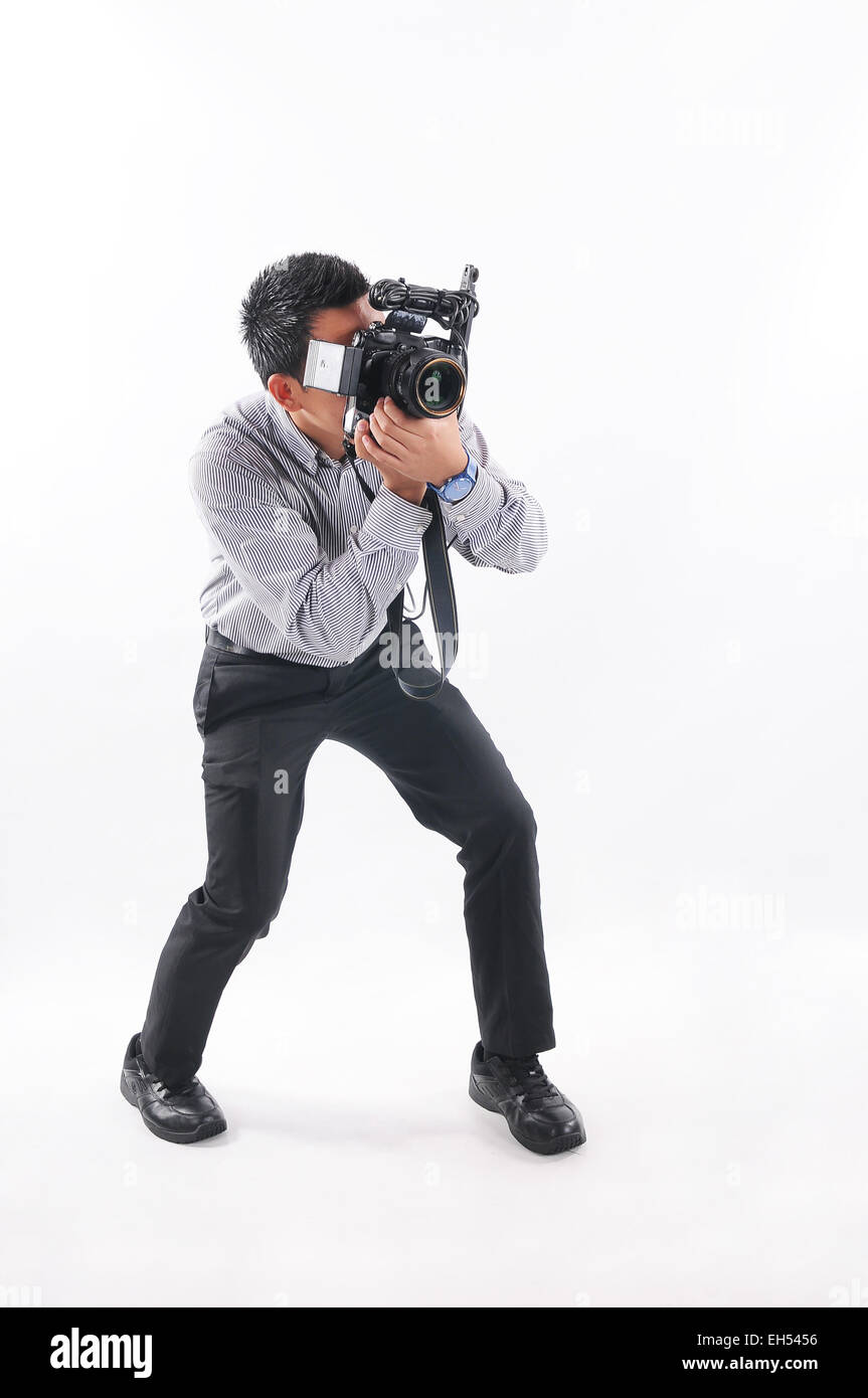 Professional male photographer taking picture Stock Photo - Alamy