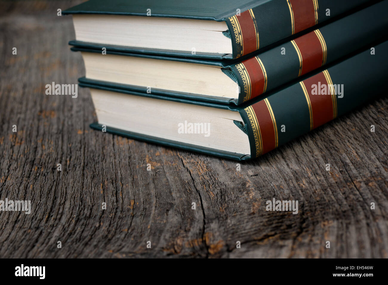 Stack of books on the table Stock Photo - Alamy