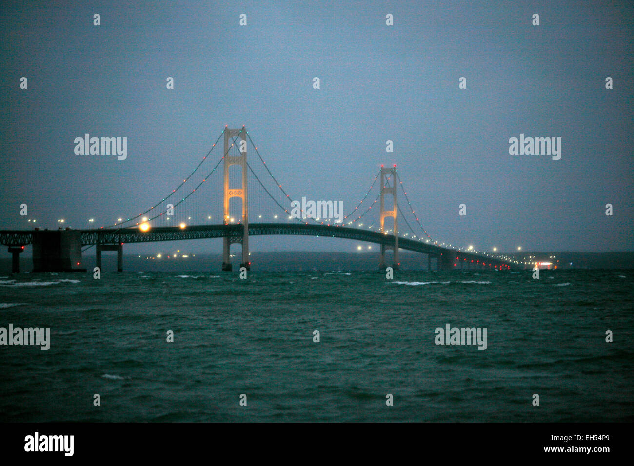 Mackinac Bridge, as seen from the Michigan shoreline where Lake Huron ...