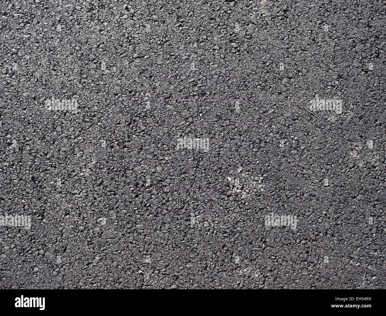 Tarmac asphalt road surfacing useful as a background Stock Photo - Alamy