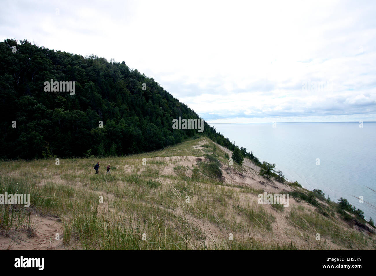 Hikers walk near Baldy in the Arcadia Dunes/C.S. Mott Nature Preserve ...
