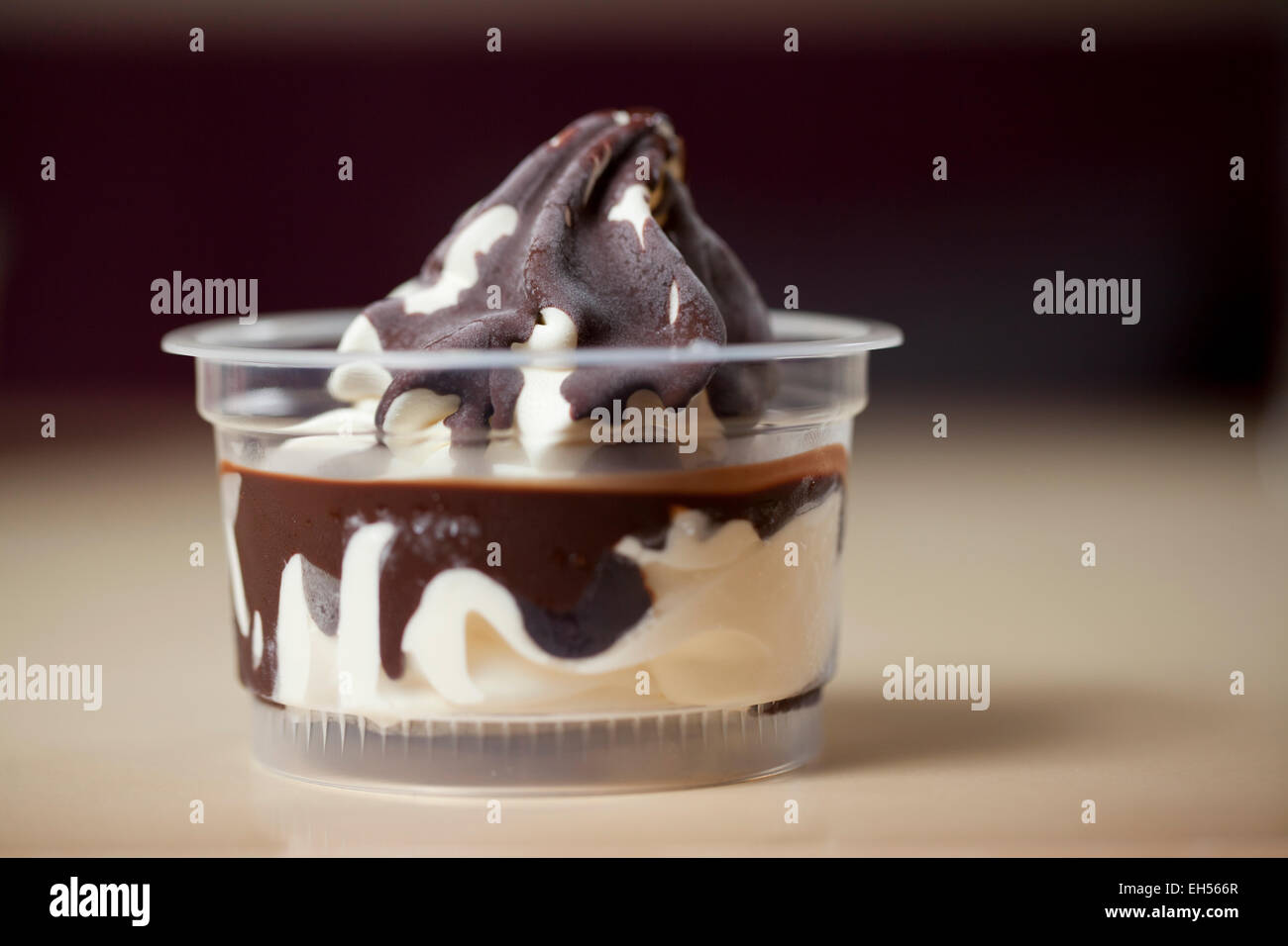 ice cream in a plastic container Stock Photo - Alamy