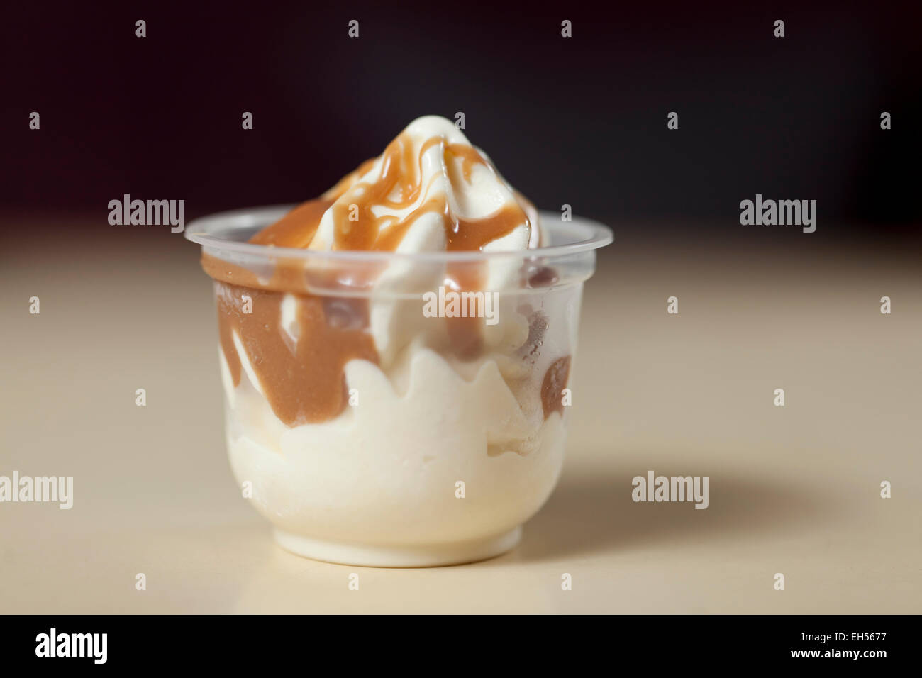 ice cream in a plastic container Stock Photo - Alamy