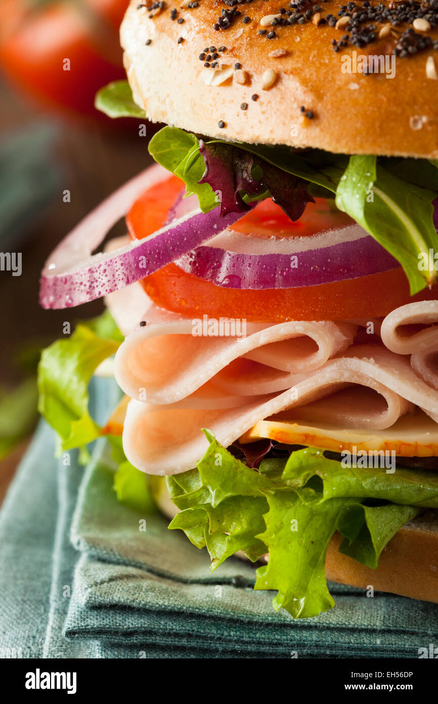 Healthy Turkey Sandwich on a Bagel with Lettuce and Tomato Stock Photo ...